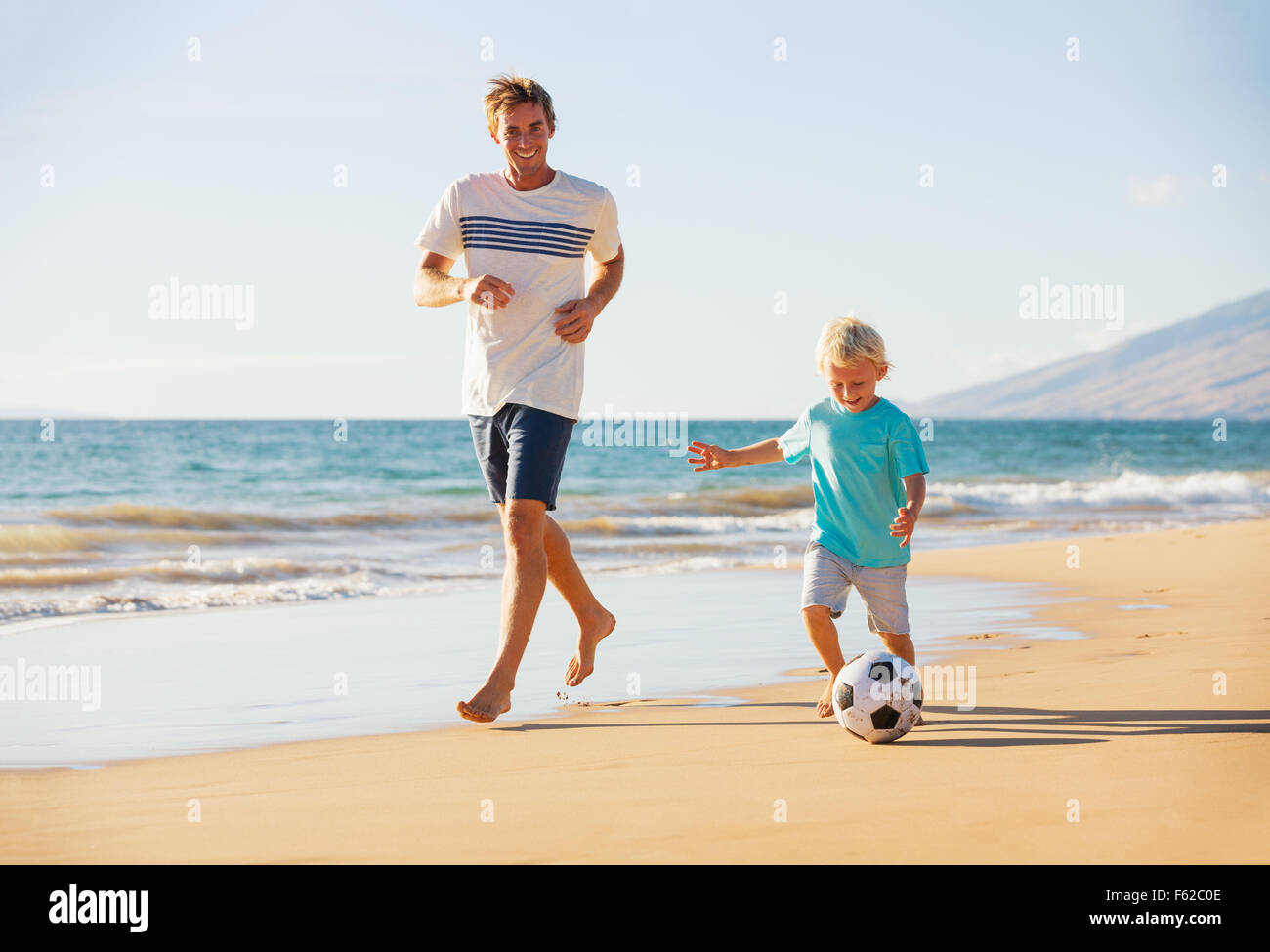 Father young son soccer ball hi-res stock photography and images - Alamy
