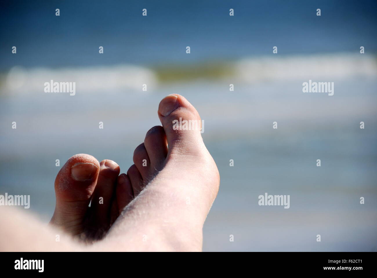 Feet At Ocean Stock Photo - Alamy