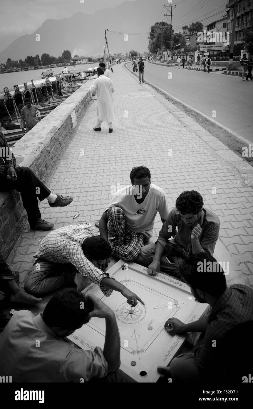 Guys playing Carrom in the street, Srinagar, India Stock Photo - Alamy