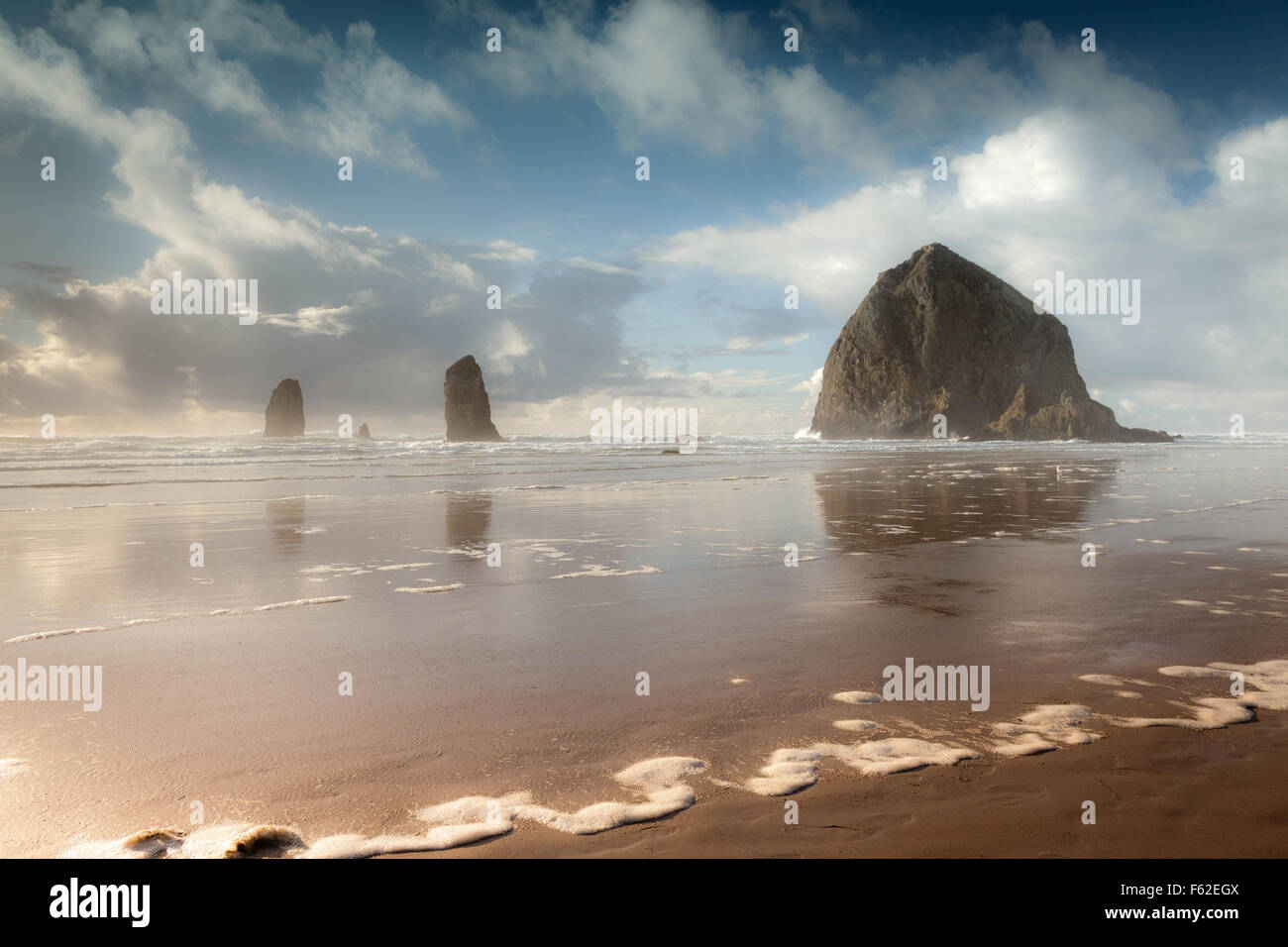 Dramatic light and sky at Haystack Rock on the Oregon coast. Haystack ...