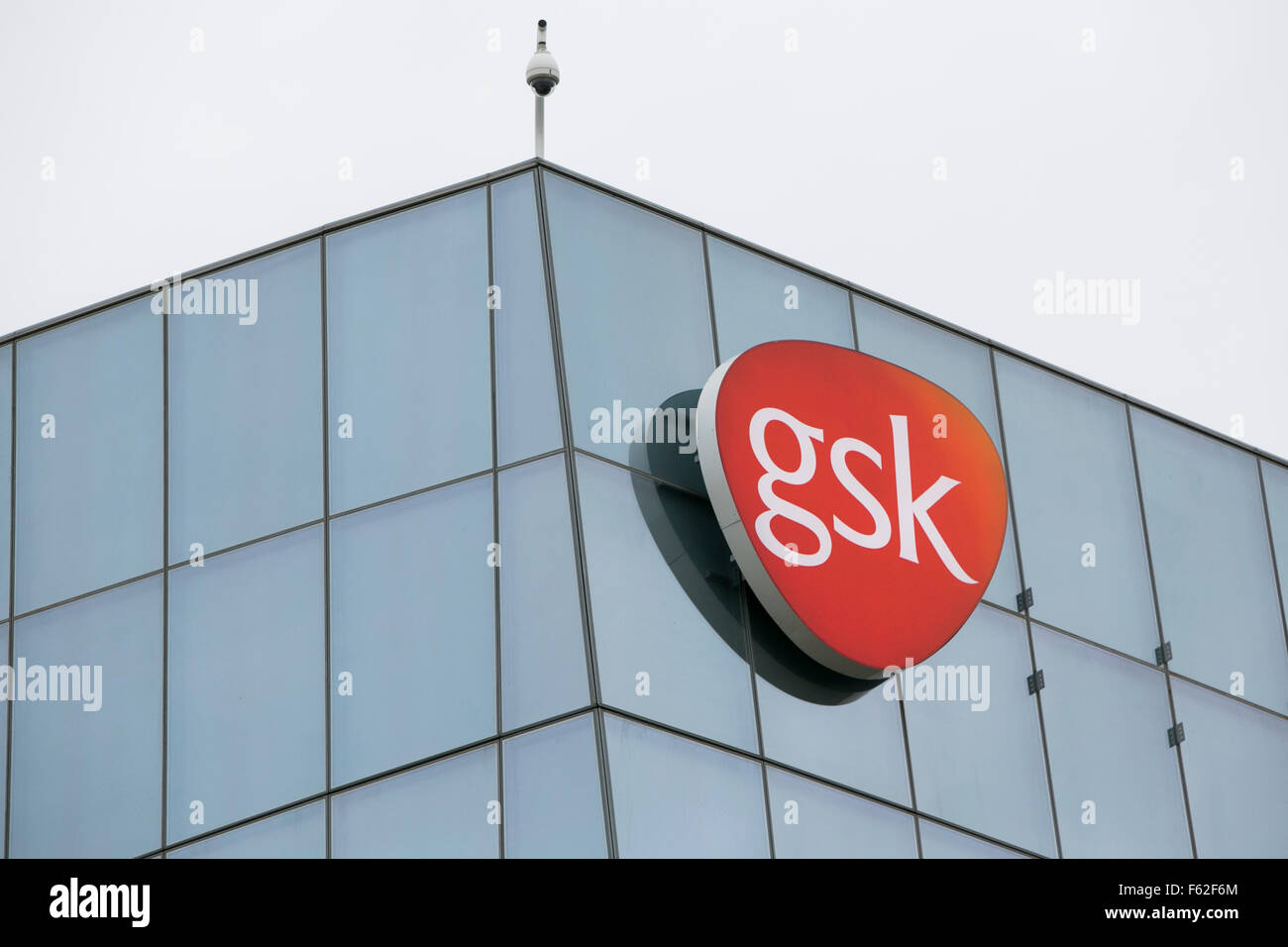 A logo sign outside of a facility occupied by GlaxoSmithKline (GSK) in ...