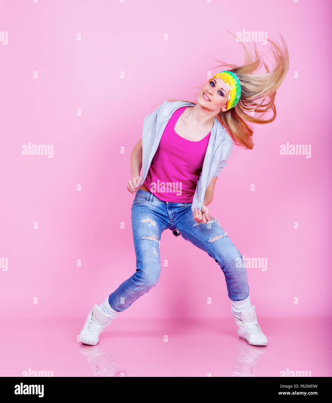 Dancing girl photo in studio Stock Photo - Alamy
