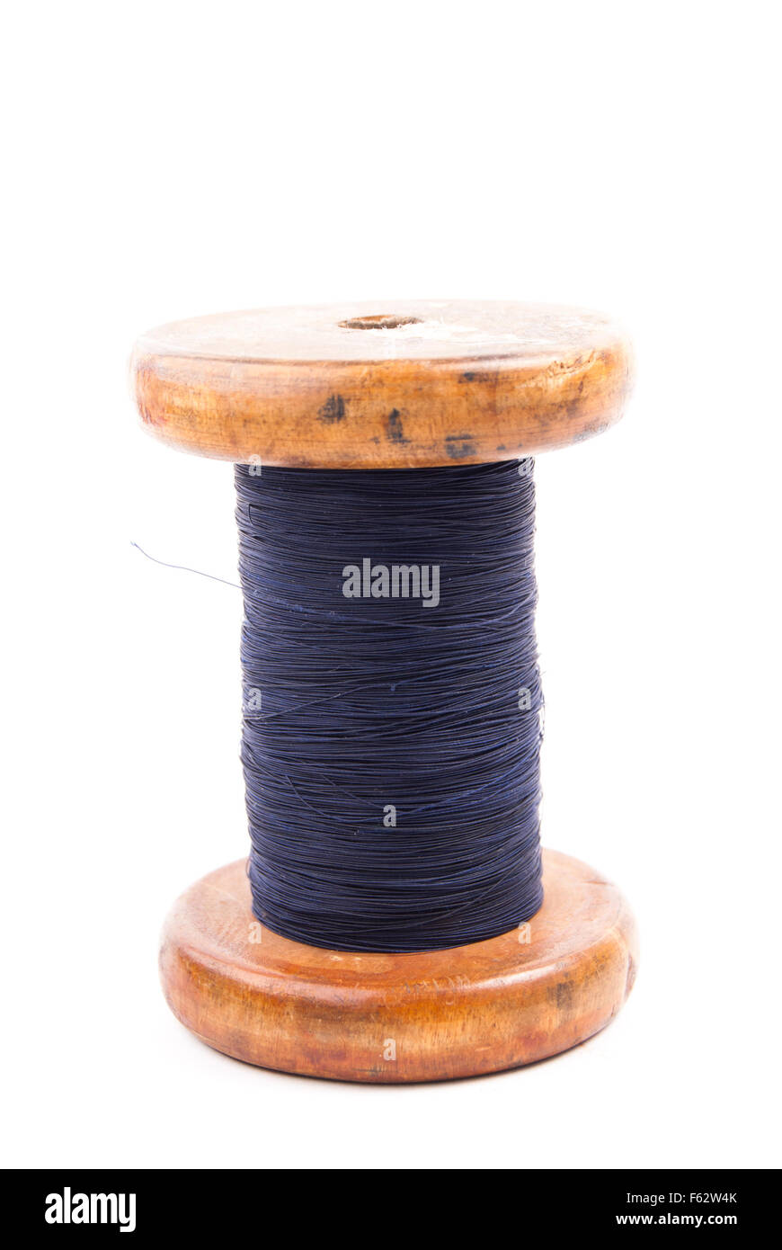 spool of thread with needle Stock Photo - Alamy