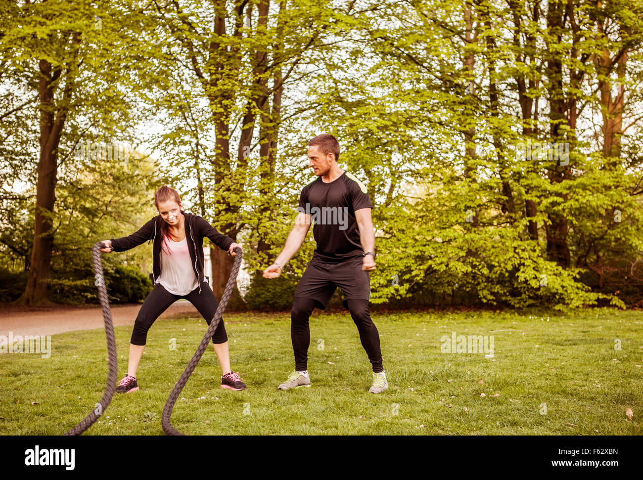 Woman Bonding Man Rope High Resolution Stock Photography and Images - Alamy
