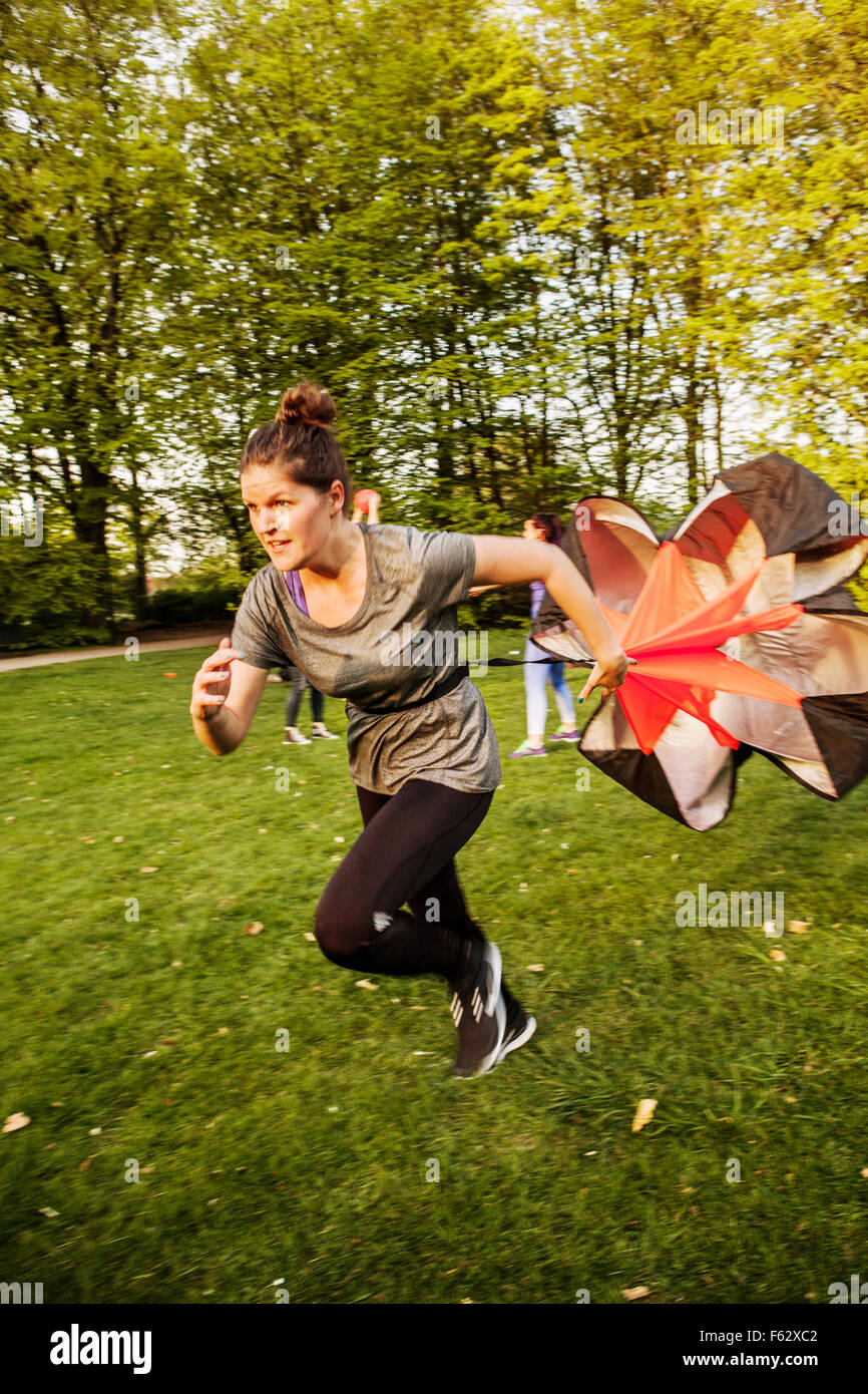 Athlete man running with parachute hi-res stock photography and images ...