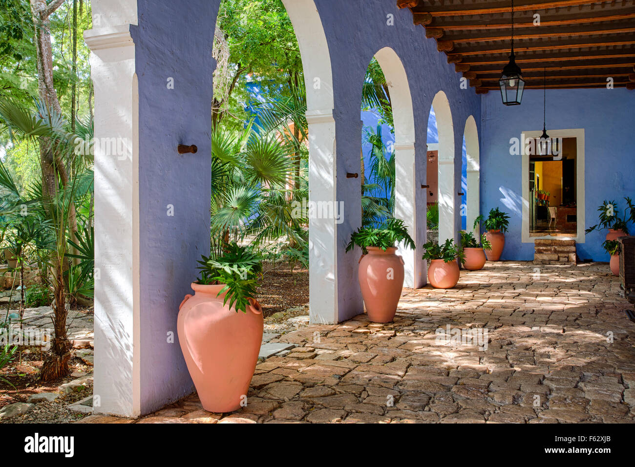 Arches line a pathway at the Santa Rosa hacienda in Yucatan, Mexico ...