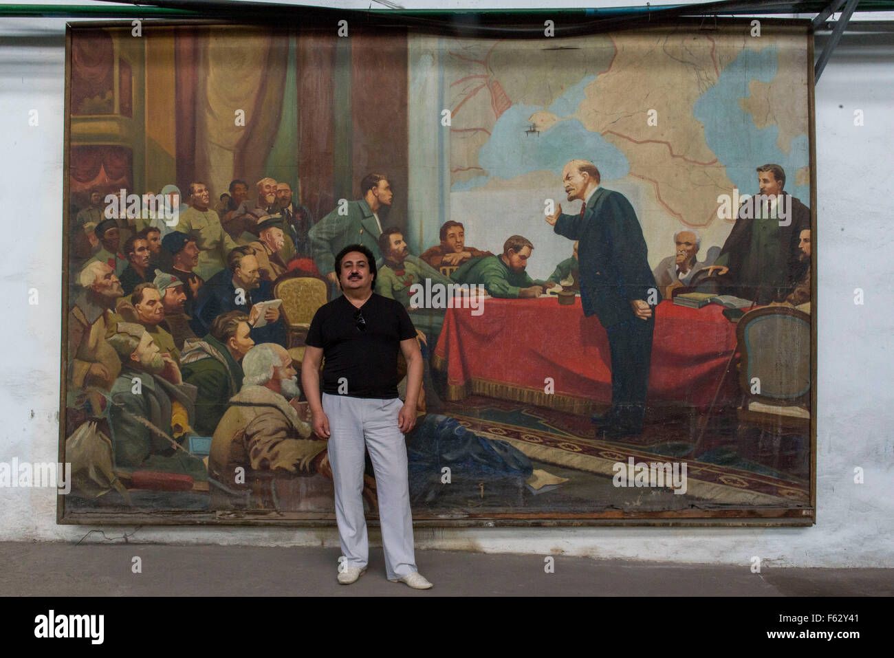 Man In Front Of Painting With Lenin Explaining Electrification of the ...