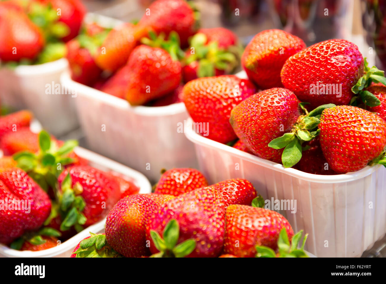 Small boxes full of fresh ripe strawberry Stock Photo - Alamy