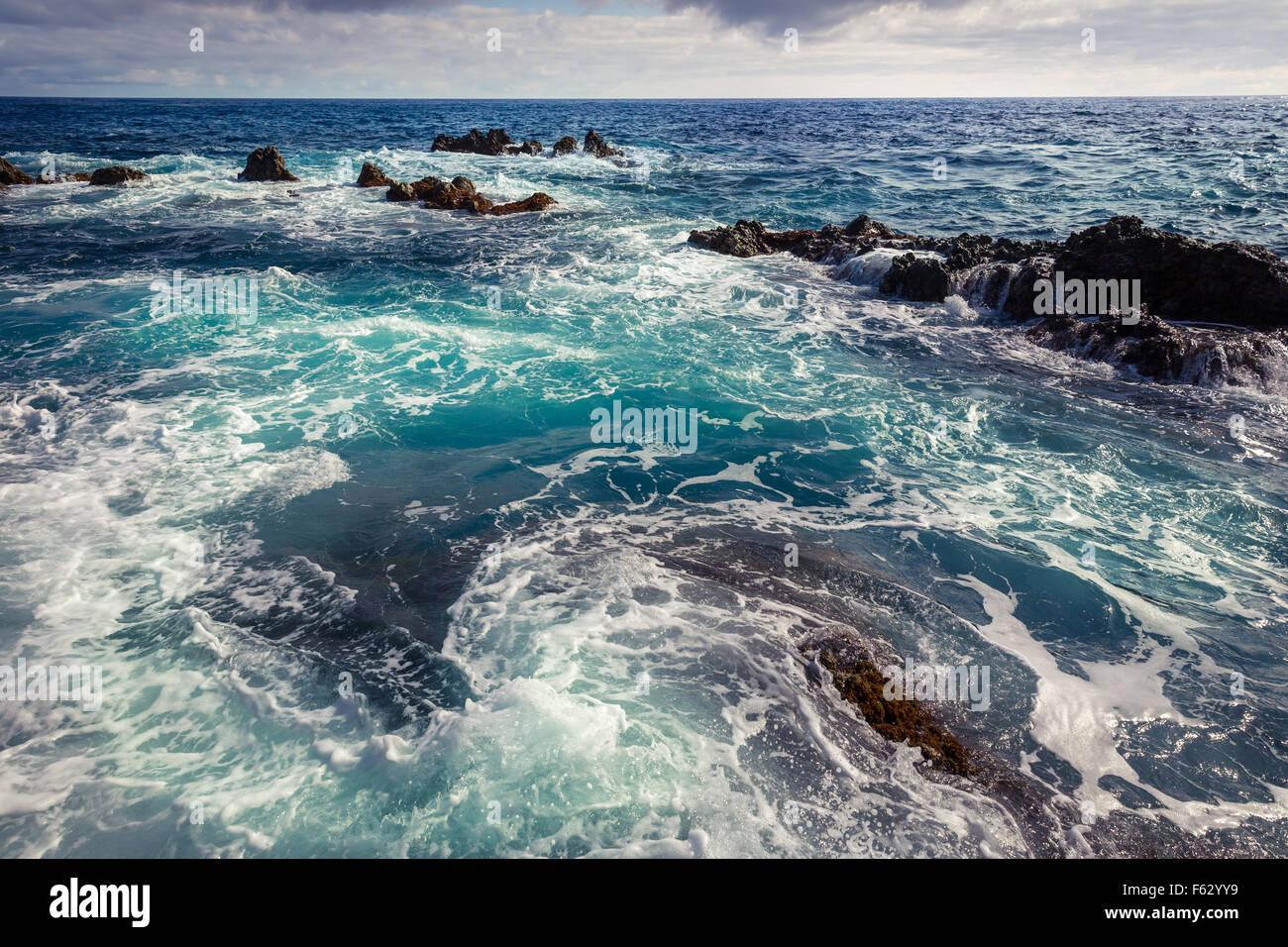 Rough ocean with waves and rocks landscape Stock Photo - Alamy