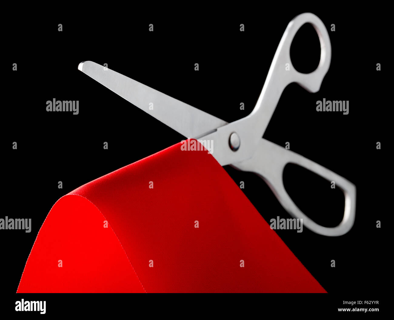 Scissors cutting red ribbon hi-res stock photography and images - Alamy
