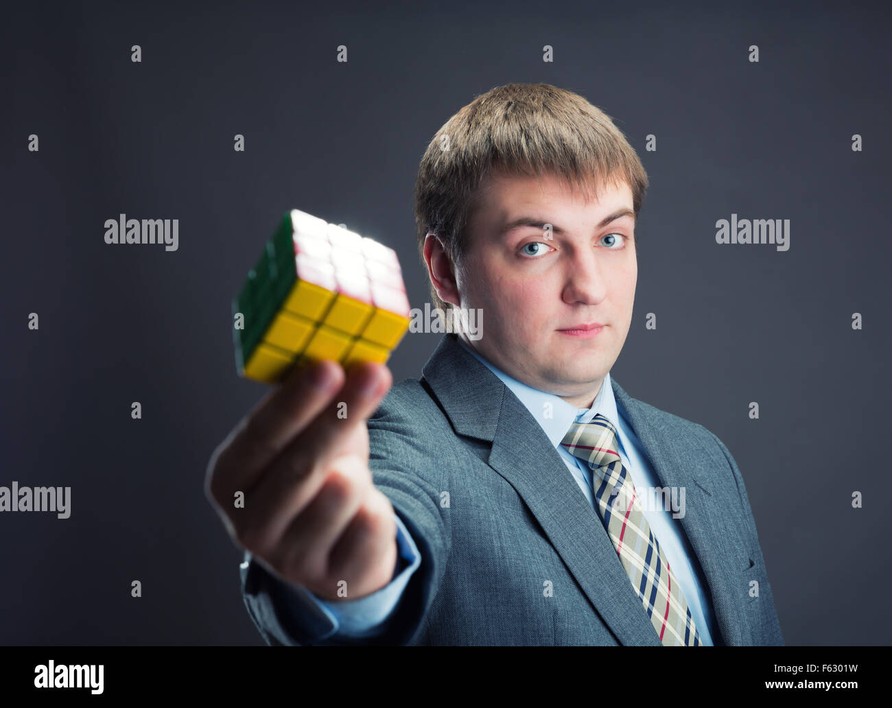 Businessman hand holding rubik cube hi-res stock photography and images ...
