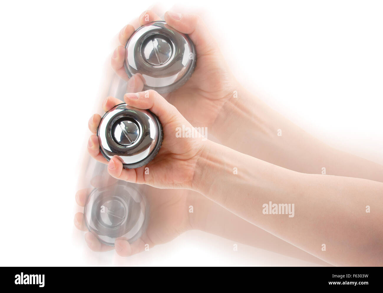 Shaking gyroscope in hand. Isolated on white background Stock Photo - Alamy