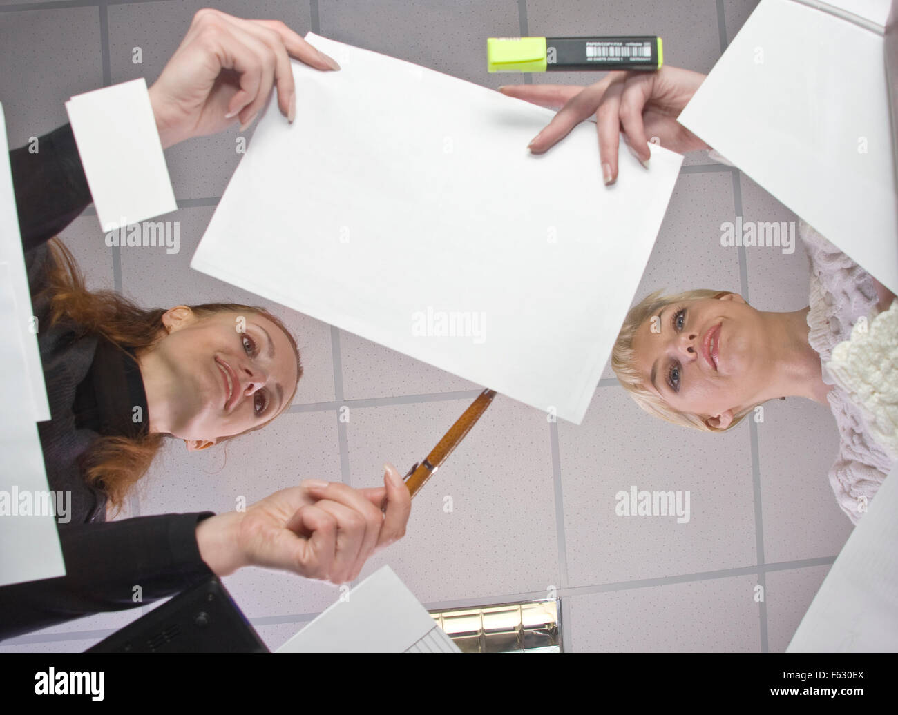 Business meeting. Under table view Stock Photo - Alamy