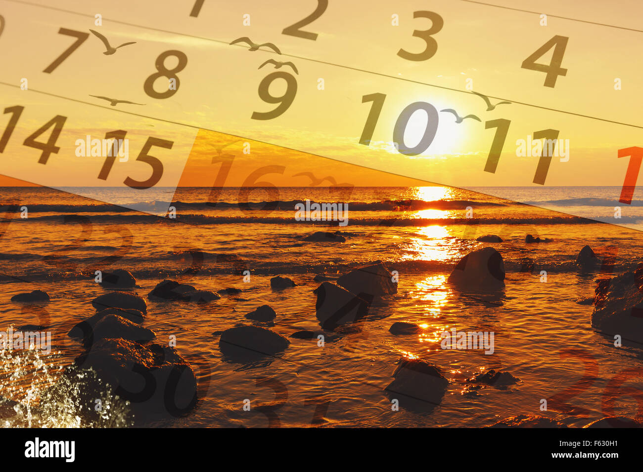 Calendar with a beautiful sunset picture Stock Photo - Alamy