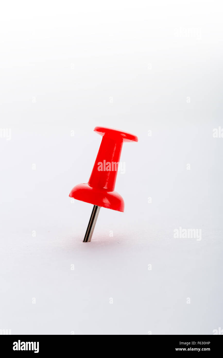 Red pushpin closeup isolated on white background Stock Photo - Alamy