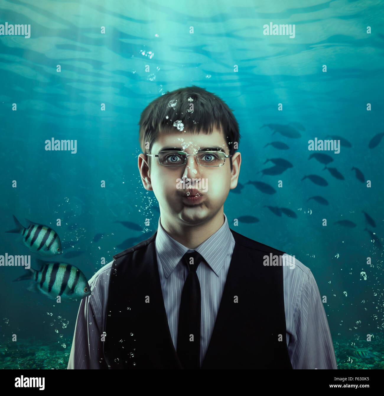 Underwater scene of a businessman with fishes, business concept Stock ...