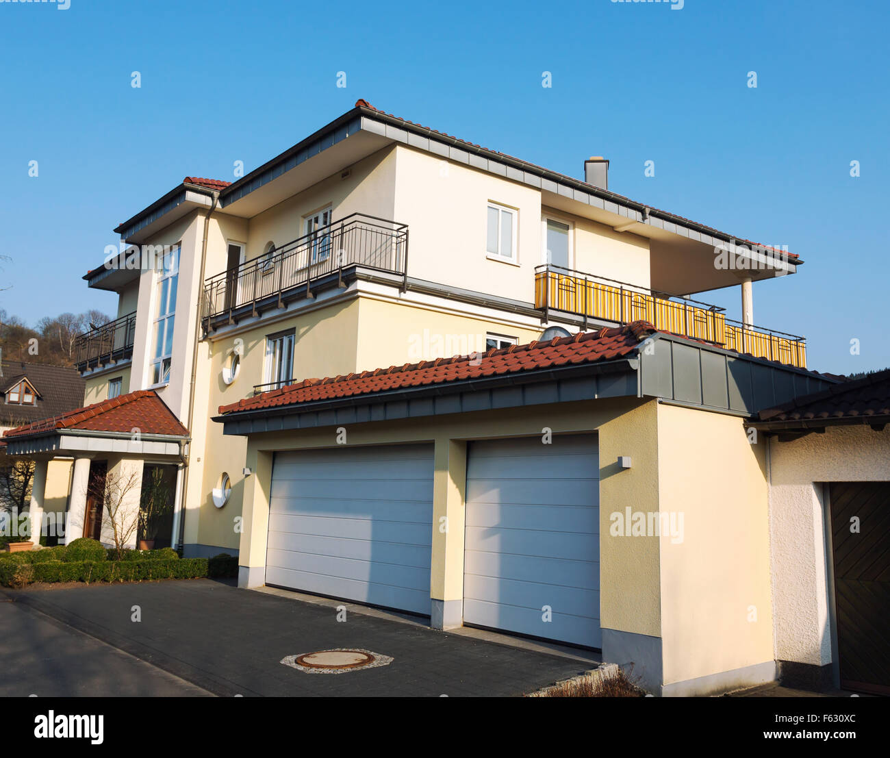 European suburban house with garage Stock Photo - Alamy