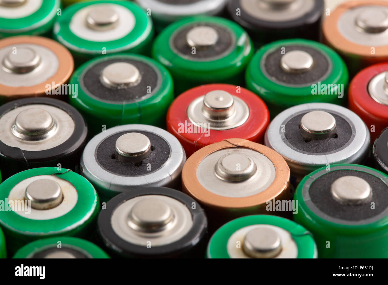Many colorful batteries in a rows Stock Photo - Alamy