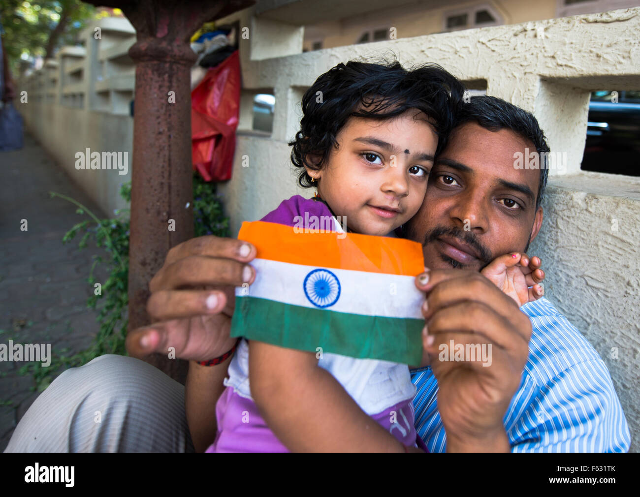 'We love India' - father and daughter holding the Indian flag in Mumbai ...