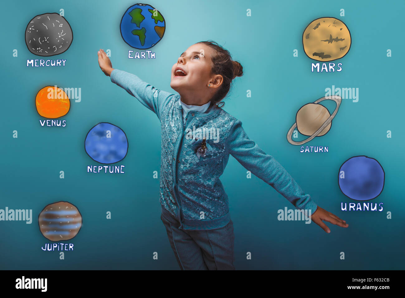 Teen girl shows a happy flight of planets in the solar system astronomy ...