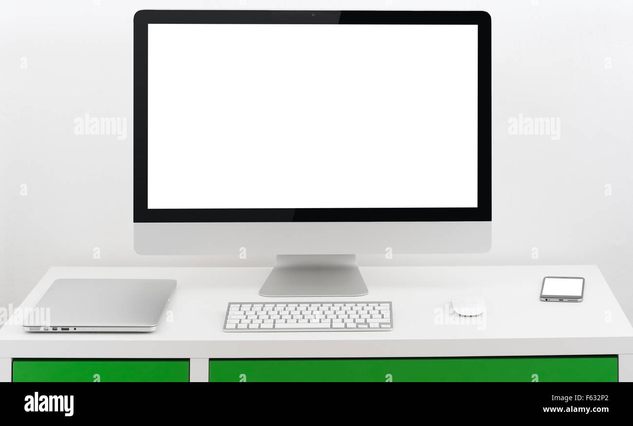 Computer Desk with keyboard and phone Stock Photo - Alamy