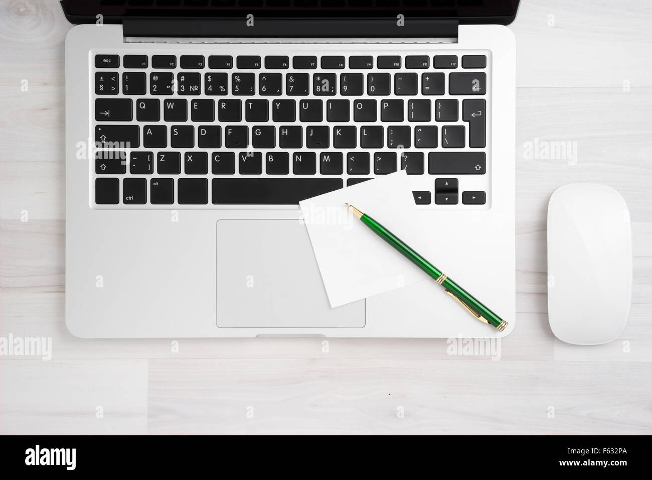 Office table ,workplace, laptop, and note paper on wooden table Stock ...