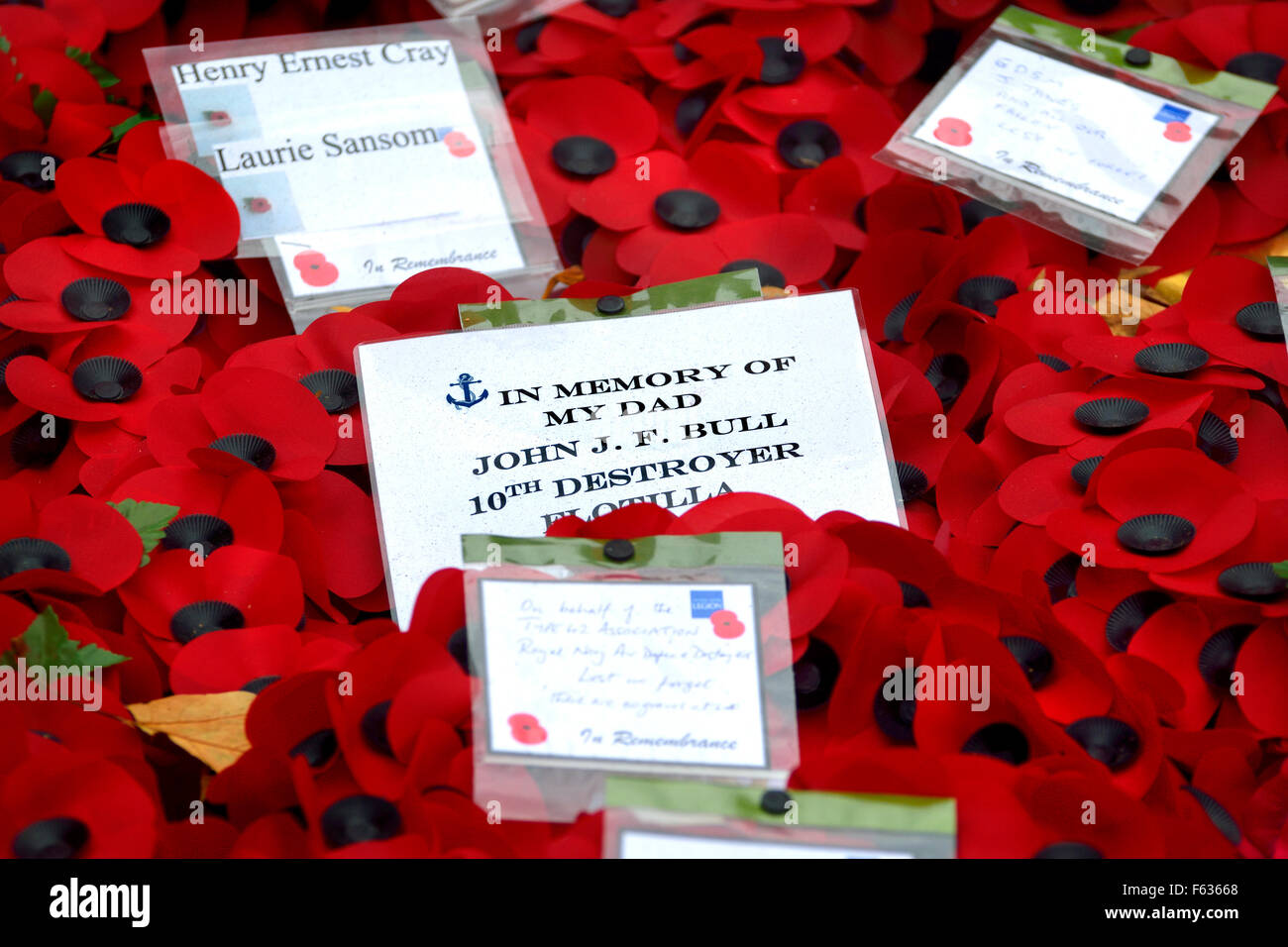 London, England, UK. Poppies and messages left at the Cenotaph in ...