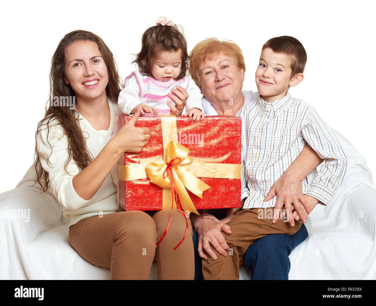 happy family with box gift, woman with child and grandmother - holiday ...