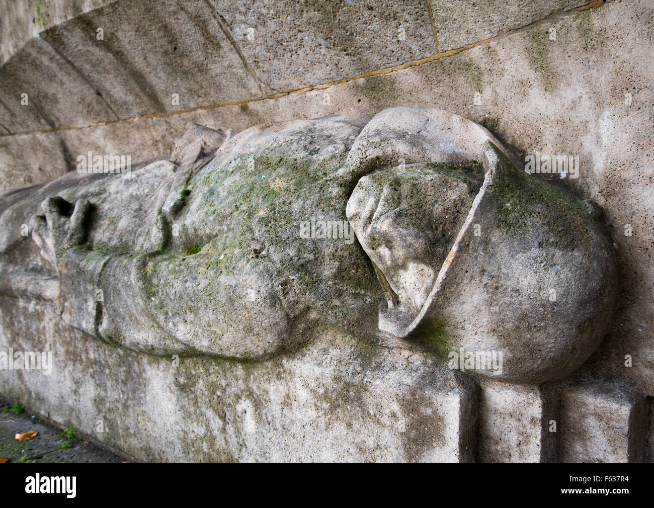 Sculpture of fallen German soldier in war cemetery from the First World ...