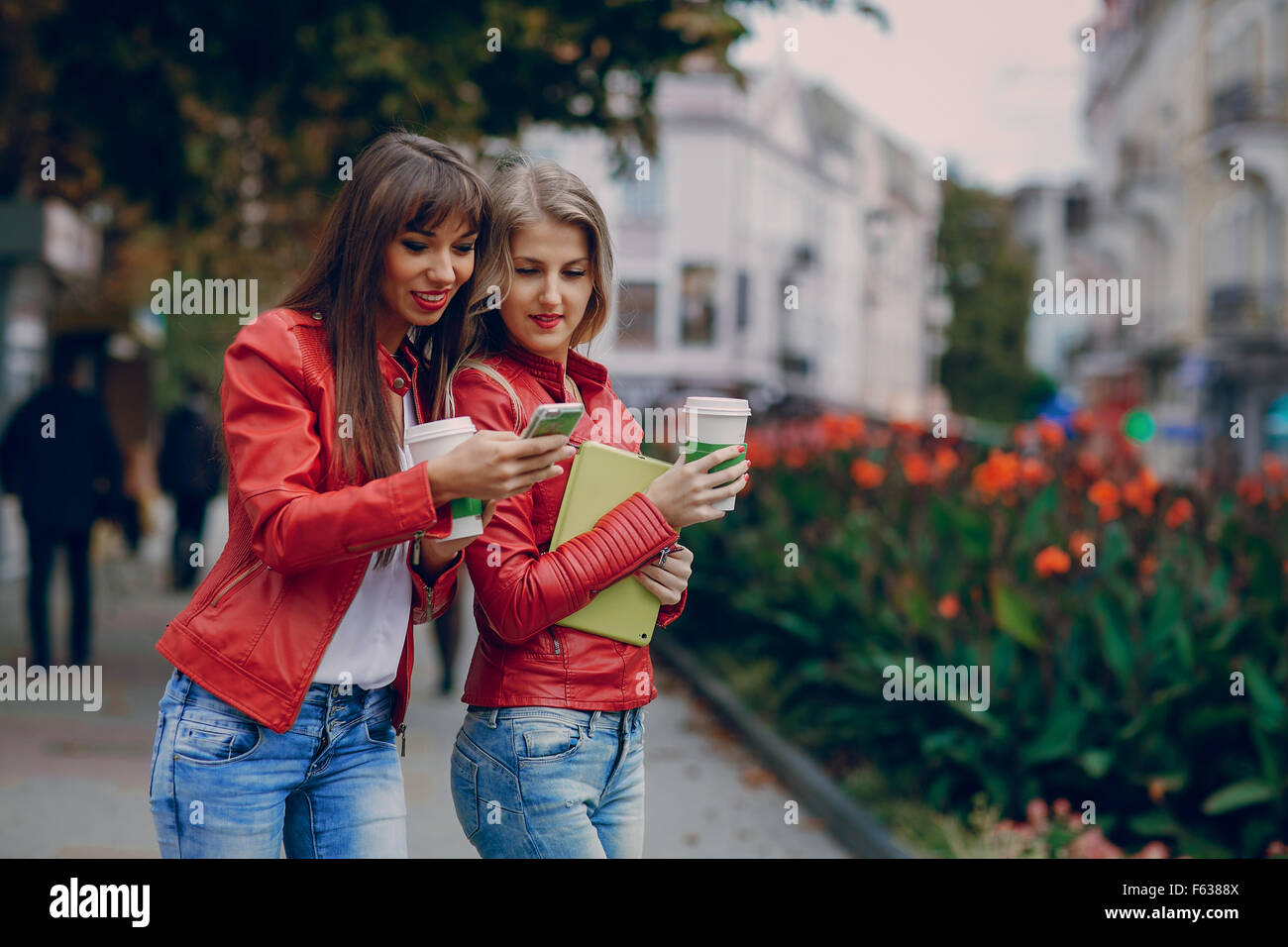 girls with phone Stock Photo - Alamy