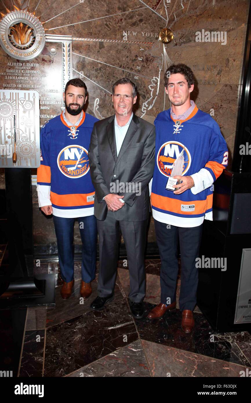 Islanders players Brock Nelson and Nick Leddy light The Empire State ...