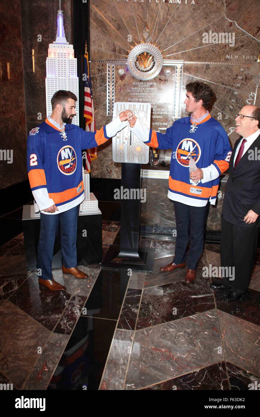 Islanders players Brock Nelson and Nick Leddy light The Empire State ...
