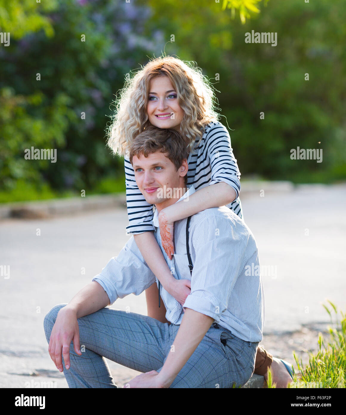 Two lovers in the park Stock Photo - Alamy