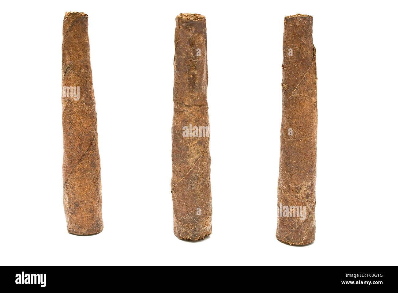 three cigars isolated on white Stock Photo - Alamy