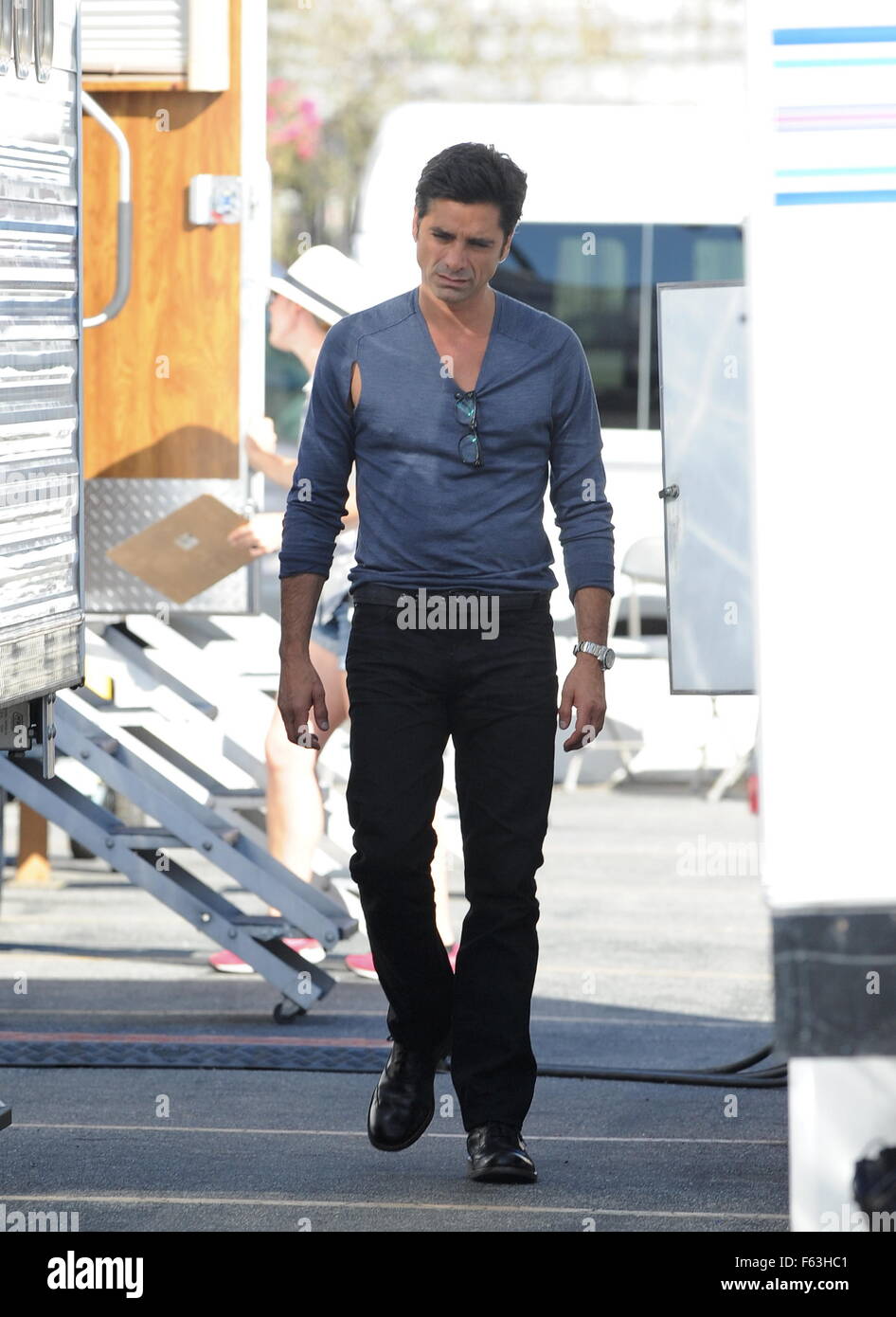 Actor John Stamos spotted with ripped up shirt on the set of ...