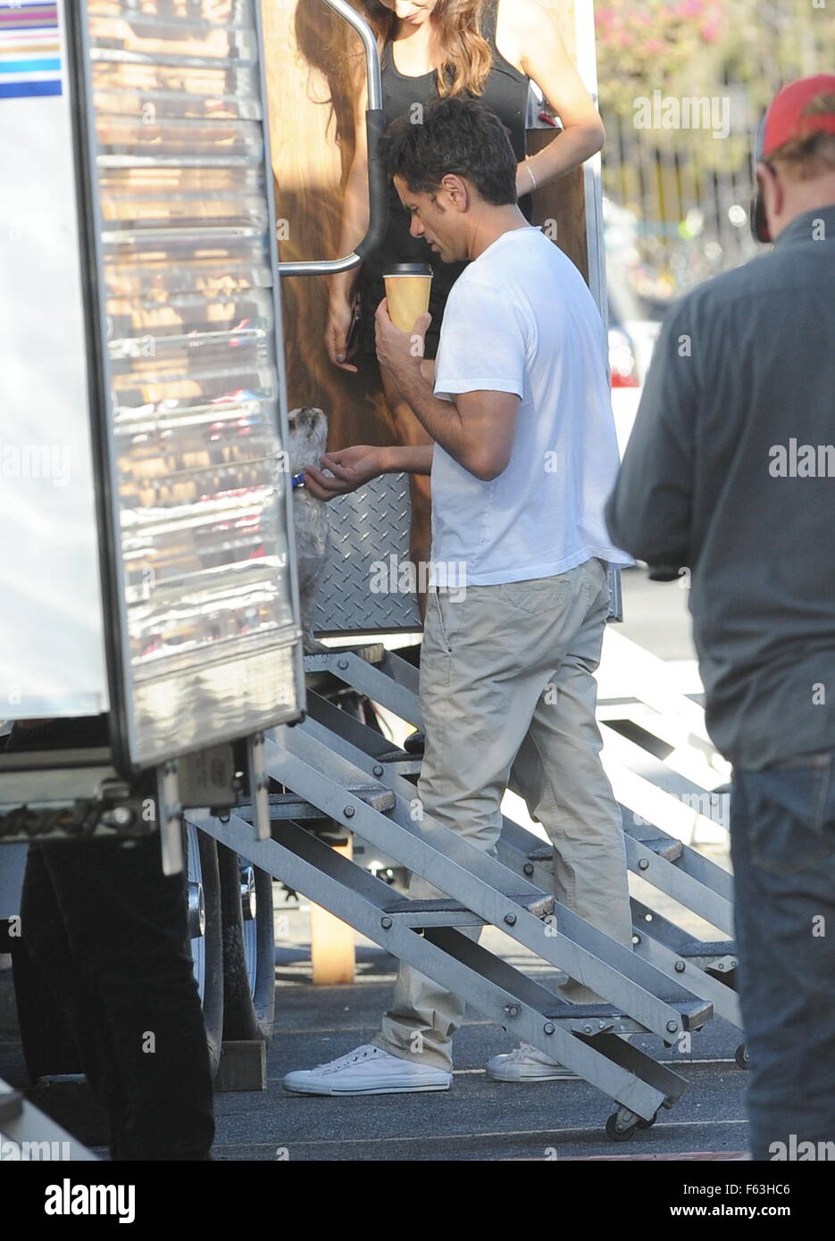 Actor John Stamos spotted with ripped up shirt on the set of ...