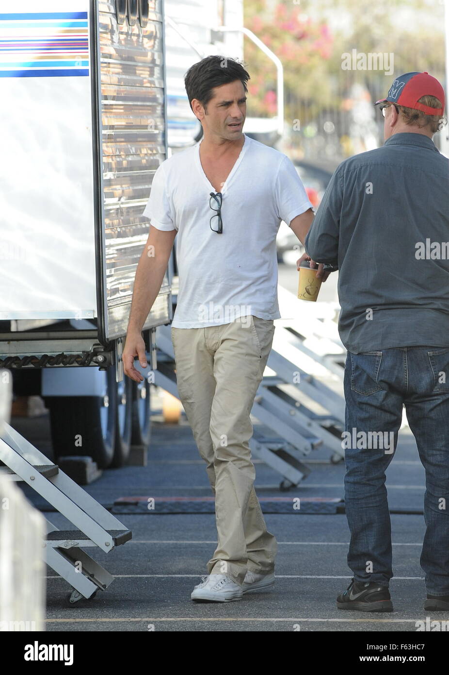 Actor John Stamos spotted with ripped up shirt on the set of ...