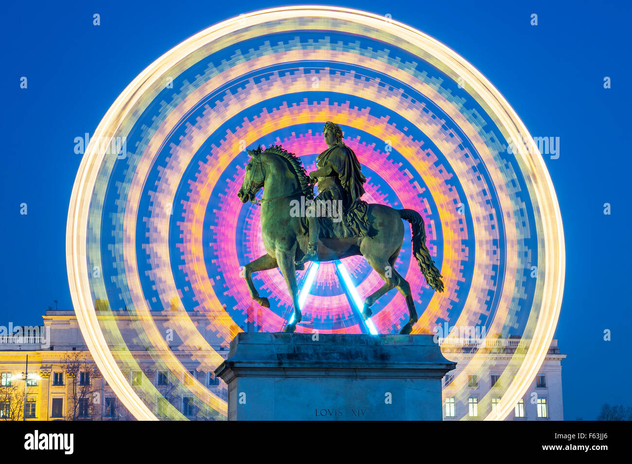Statue of Louis XIV and wheel by night, Lyon, France Stock Photo - Alamy