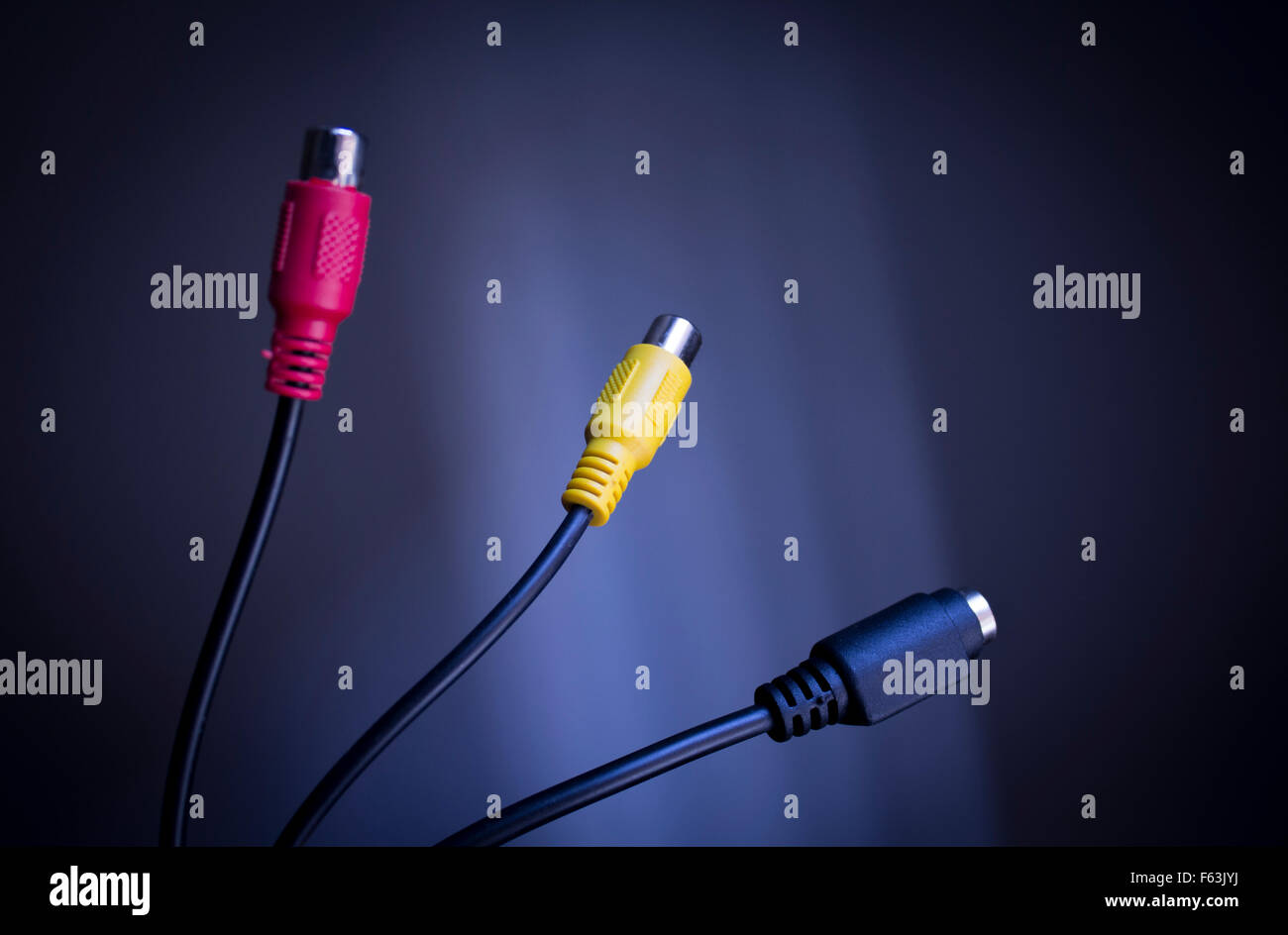 TV connectors on a dark background - AV cable Stock Photo - Alamy