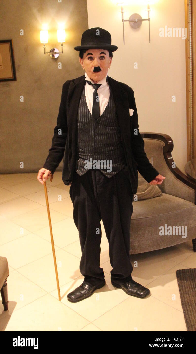 A lookalike of Charlie Chaplin poses for pictures in Beverly Hills ...