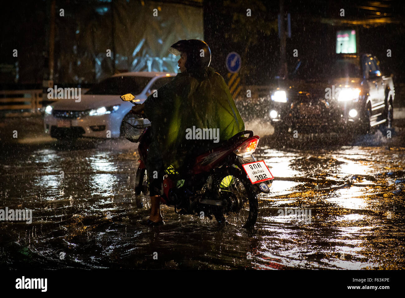 Drivers in heavy rains in Northern Thailand Stock Photo - Alamy