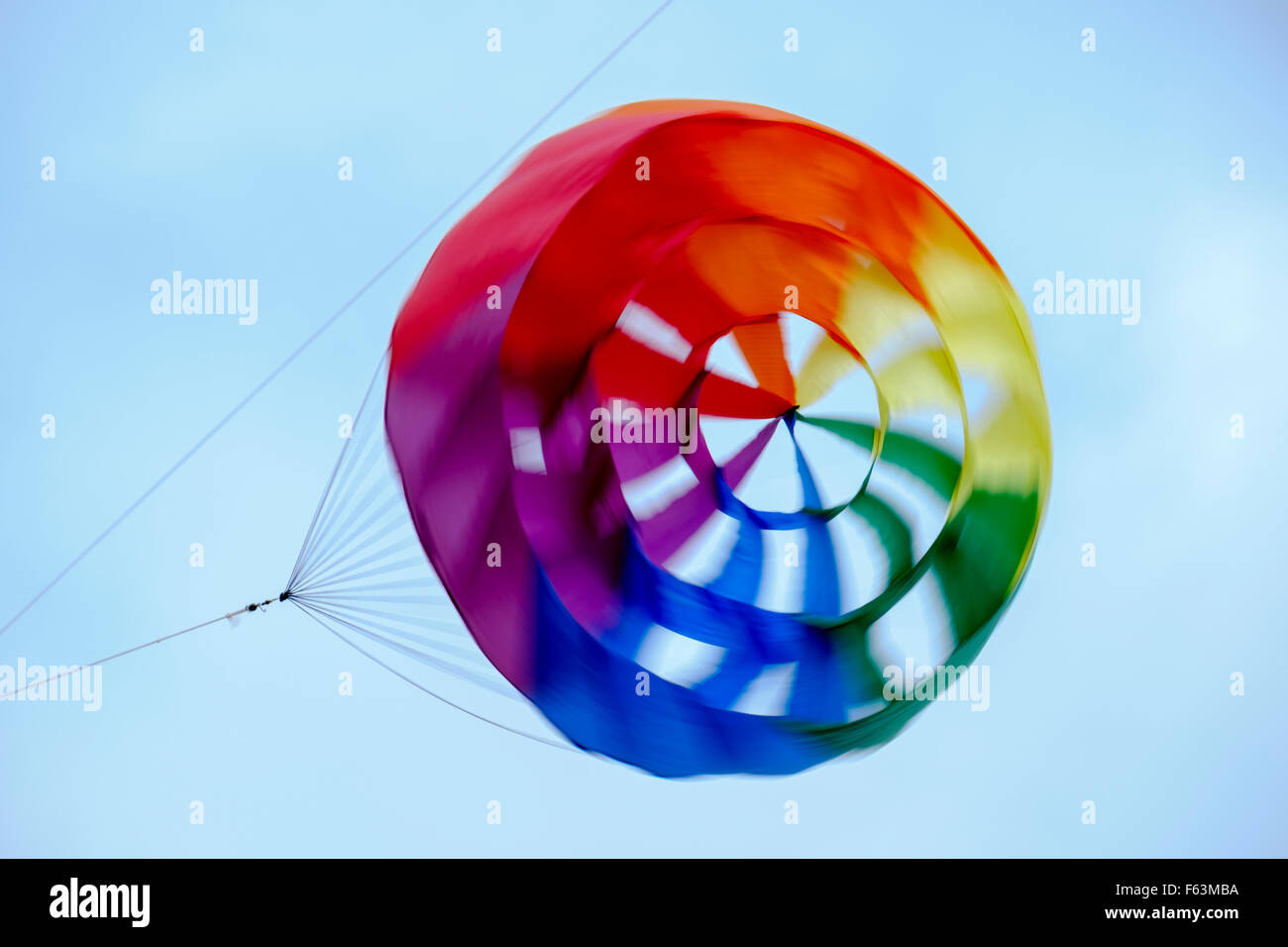 Colourful kite blowing in the wind Stock Photo - Alamy
