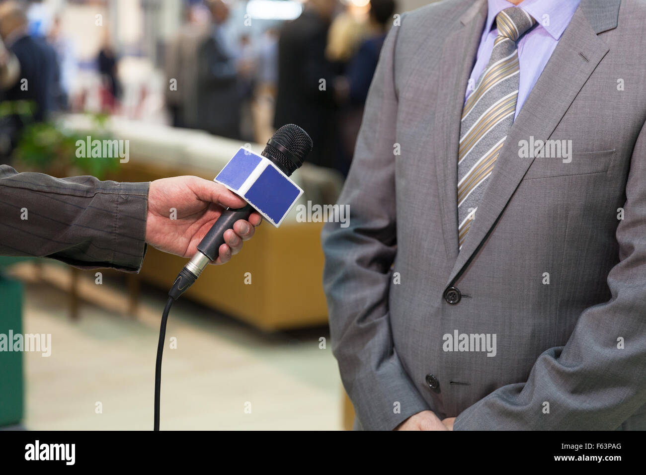 Journalist making interview with businessman or politician Stock Photo ...