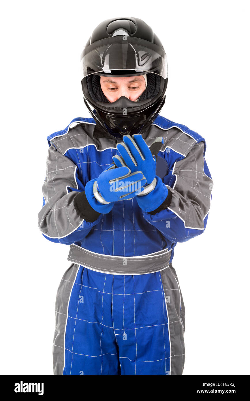 Racing driver posing with helmet isolated in white Stock Photo - Alamy