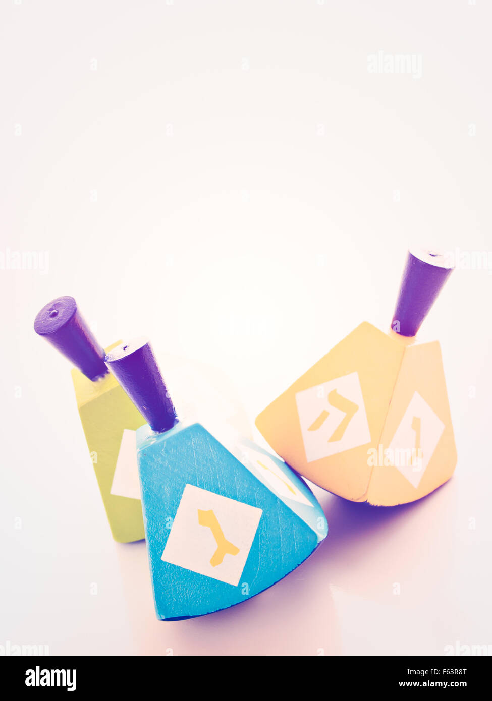 Colorful dreidels on white background Stock Photo - Alamy