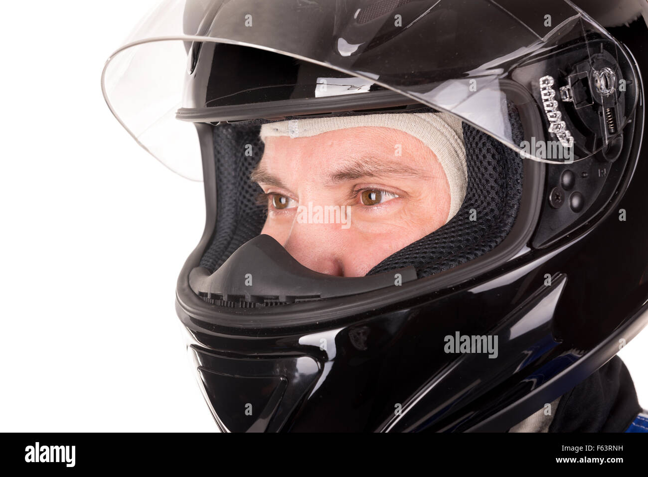 Racing driver head with helmet isolated in white Stock Photo - Alamy