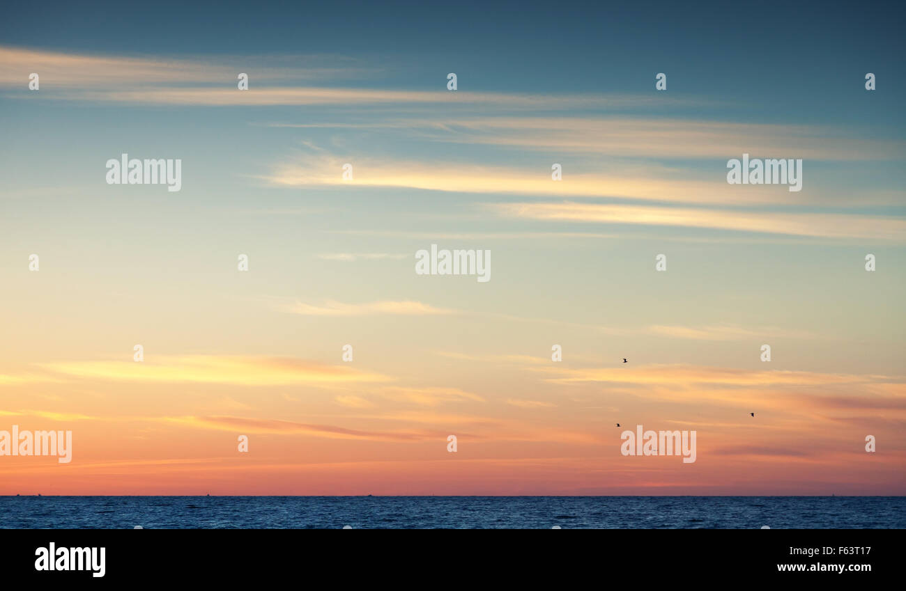 Colorful sunset sky over Atlantic ocean, natural background photo with ...