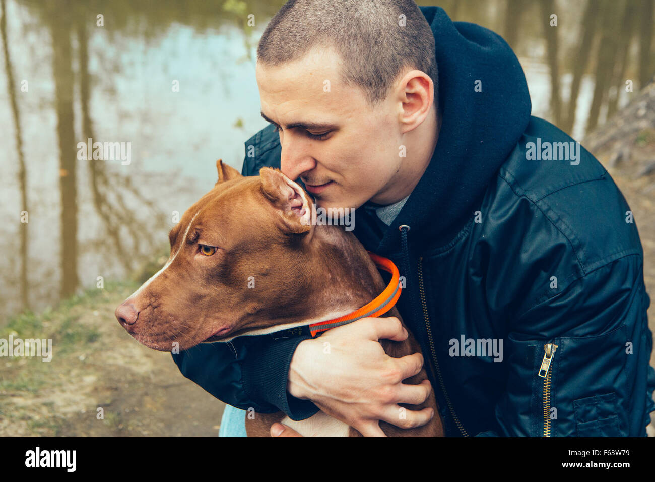 Man with dog nature autumn lake outdoor Stock Photo - Alamy