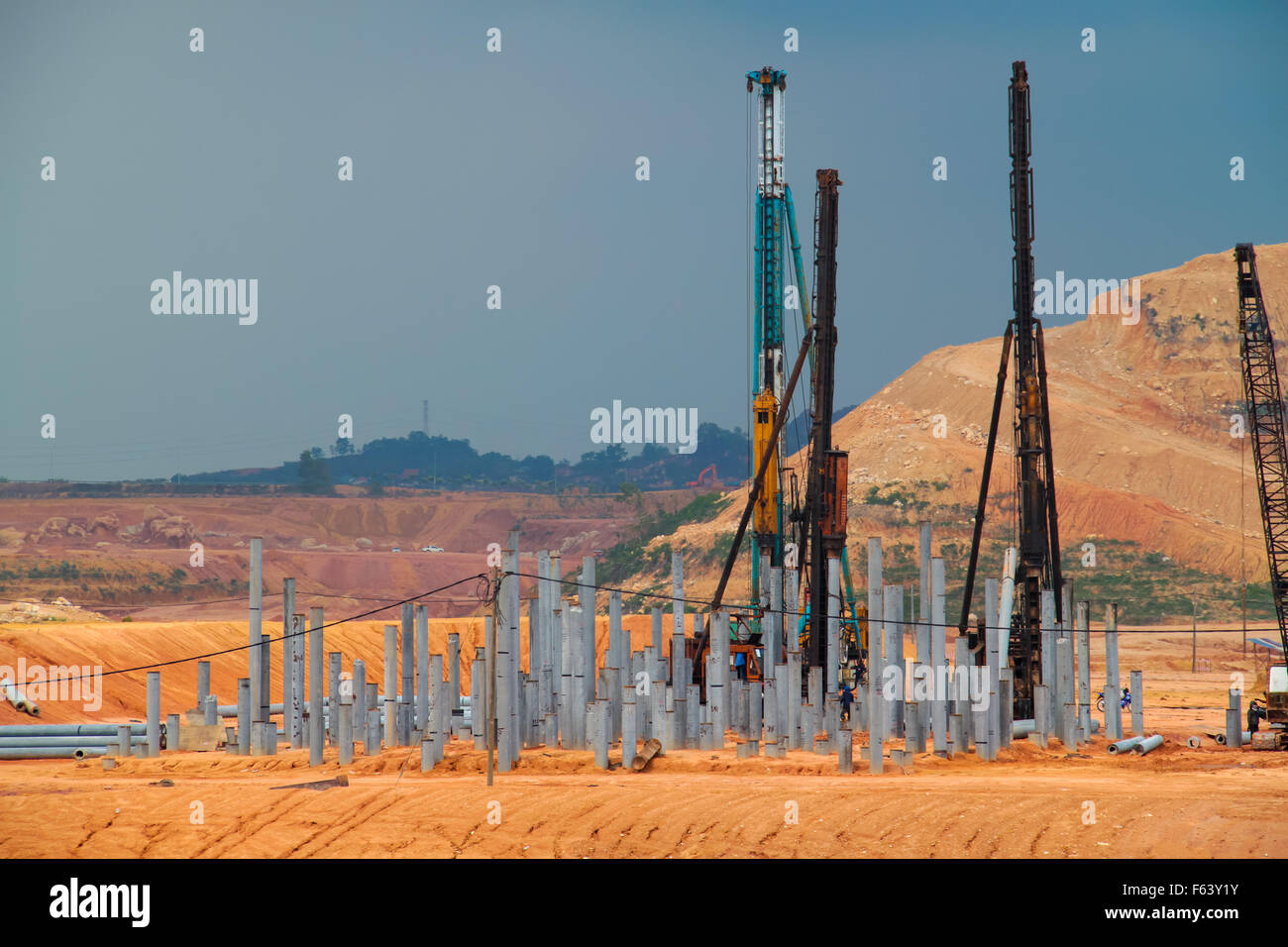 Piling construction work on a piece of flat land Stock Photo - Alamy