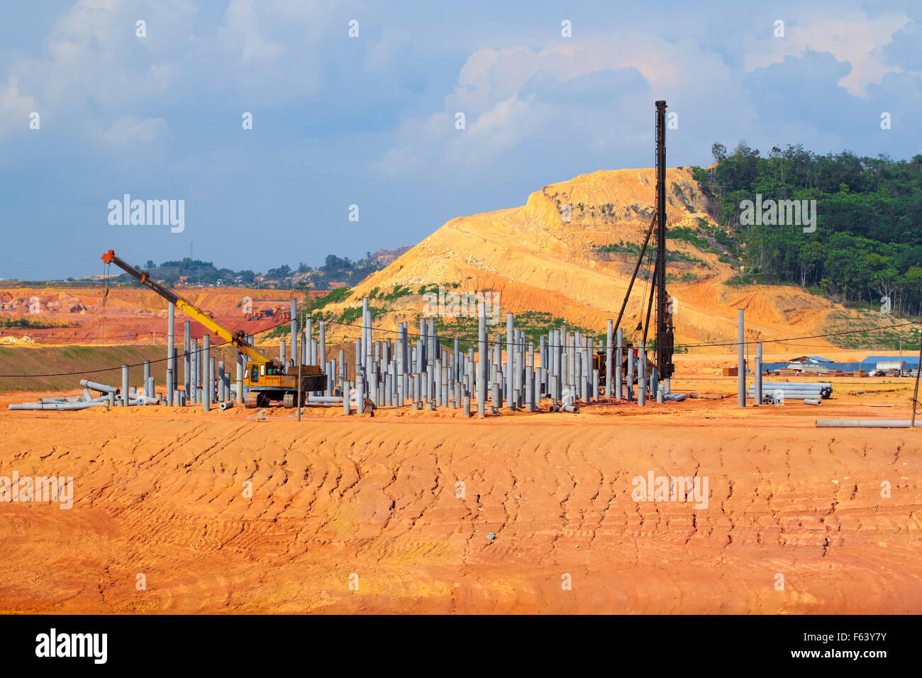 Piling construction work on a piece of flat land Stock Photo - Alamy